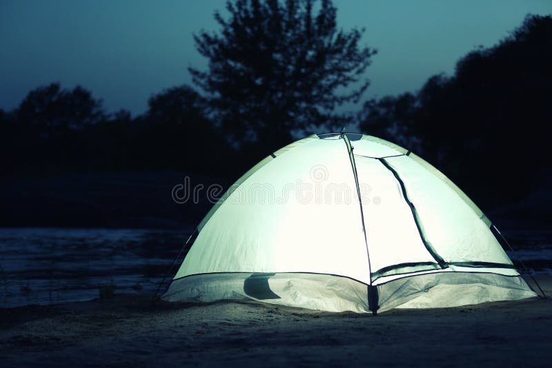 Small Camping Tent Glowing in Twilight Outdoors Stock Image - Image of ...