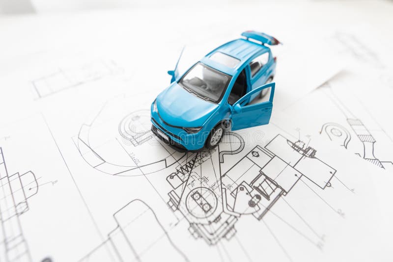 Small Car Model and Blueprint Sheets. Stock Photo - Image of ...