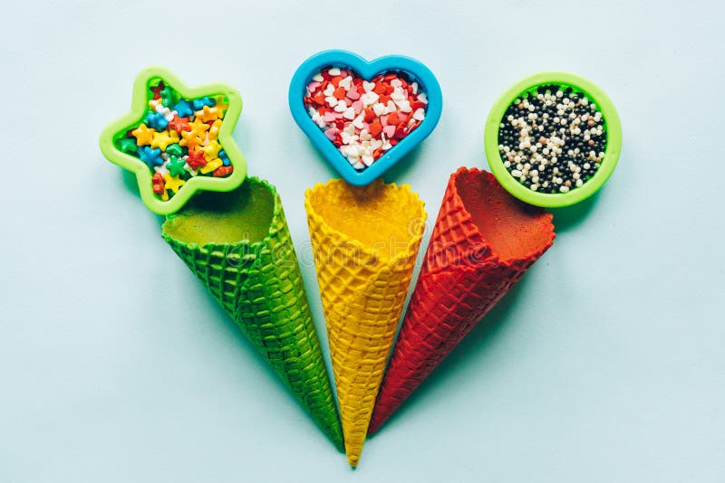 Small Caramels are Scattered on the Surface of Wafer Cones. Stock Photo ...