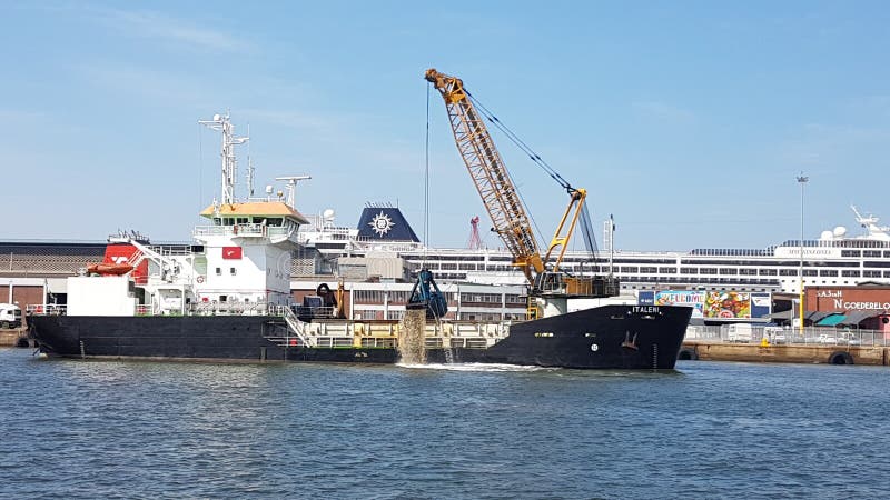 Small Cargo Transport Boat with Wooden Crate Ploughing through Waves on ...