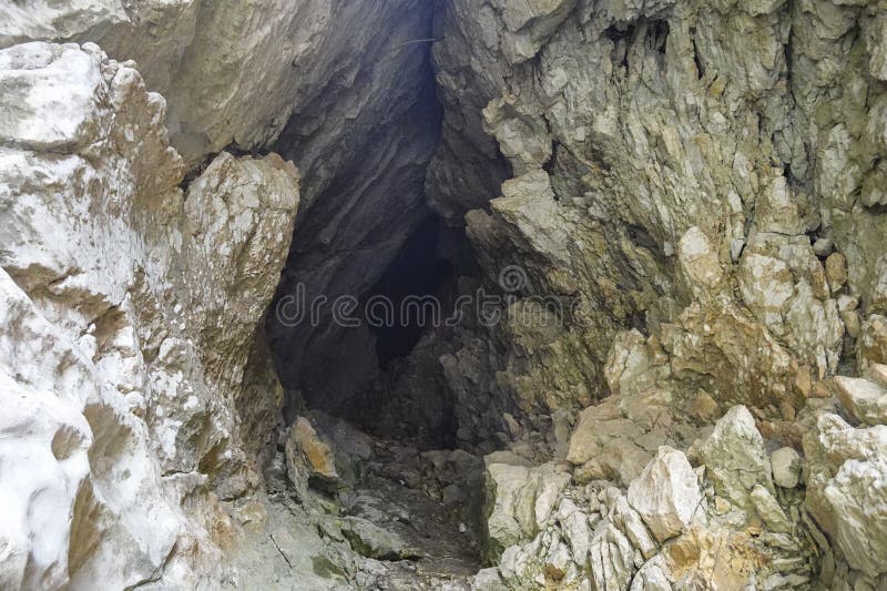 A Small Cave with a Hole in the Middle Stock Photo - Image of nature ...