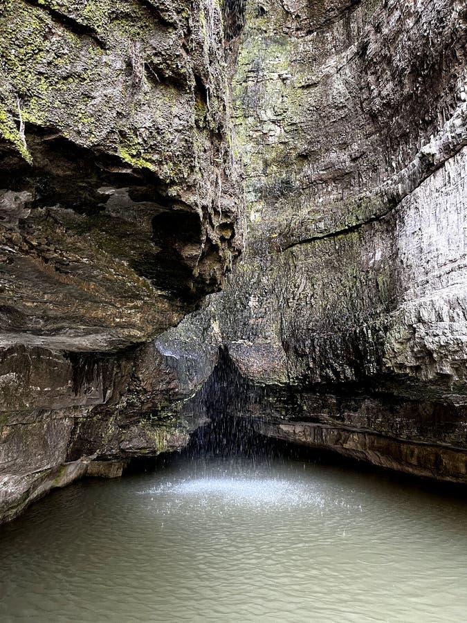 Small Cave with a Waterfall Stock Image - Image of nature, water: 276913475