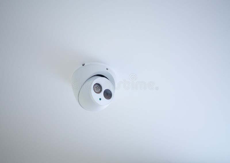 Small CCTV Camera Security Mounted on the Ceiling Stock Photo - Image ...