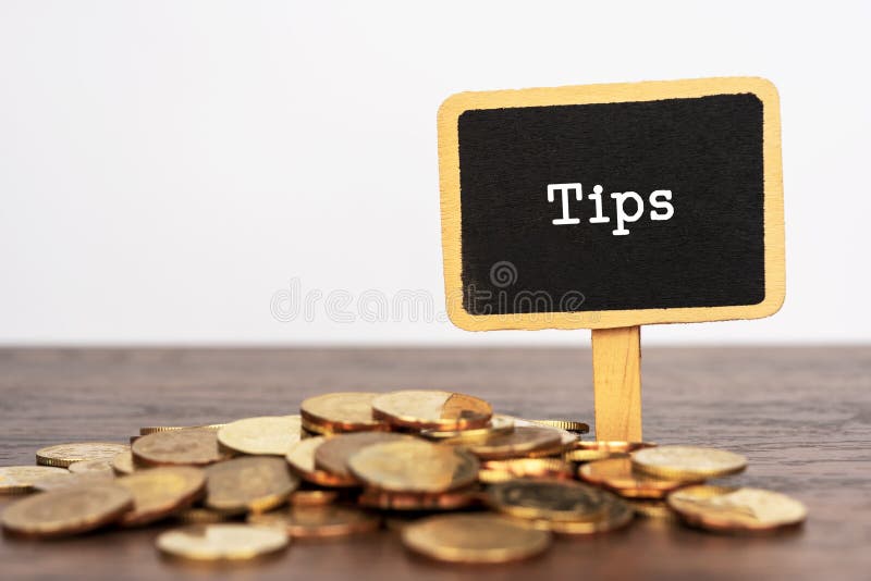 Small Chalkboard with Text Tips and Coins Stock Photo - Image of ...