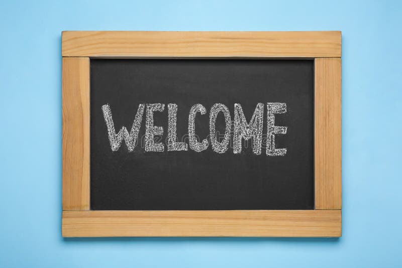 Small Chalkboard with Word Welcome on Light Blue Background, Top View ...