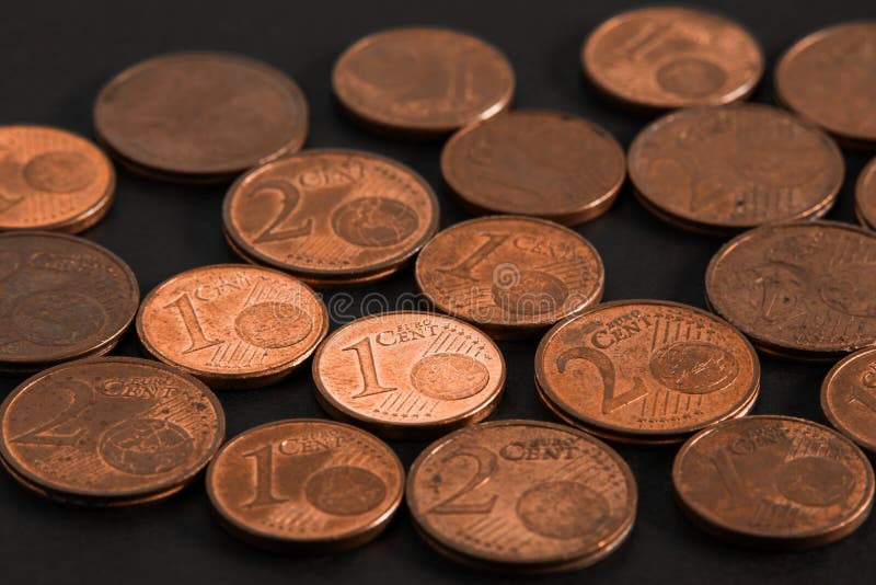 Small Change Coins Close-up. Caper Euro Cent Coins on a Black ...