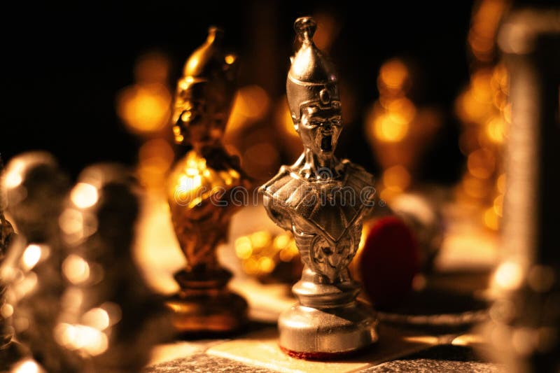 Small Chess Board with Intricately Crafted Golden Chess Pieces Arranged ...