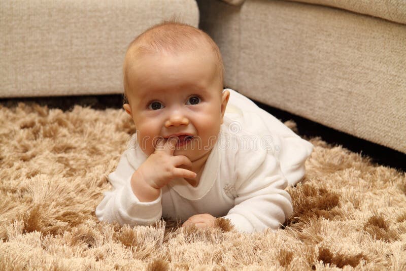 Small child on carpet stock photo. Image of child, male - 12437268