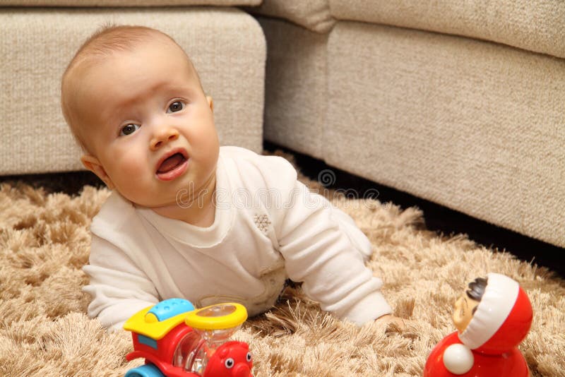 Small child on carpet stock photo. Image of child, male - 12437268