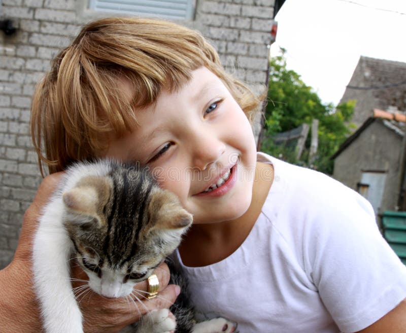 Happiness is a New Kitten stock photo. Image of adoring - 179780