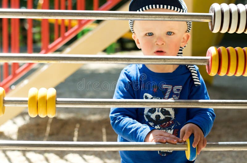 Small Child Playing with Big Child Counter Stock Image - Image of ...