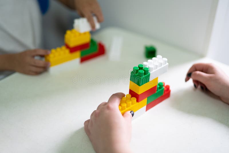 A Small Child Plays with a Constructor while Building Stock Image ...