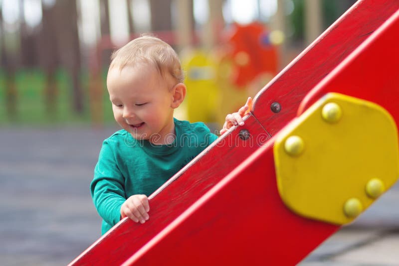 A Small Child Plays a Playground Stock Photo - Image of education ...