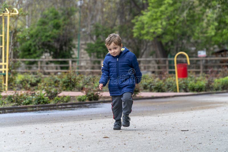 Small Child Running in a Park Stock Image - Image of child, little ...