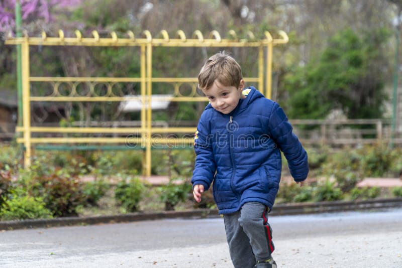 Small Child Running in a Park Stock Photo - Image of cheerful ...