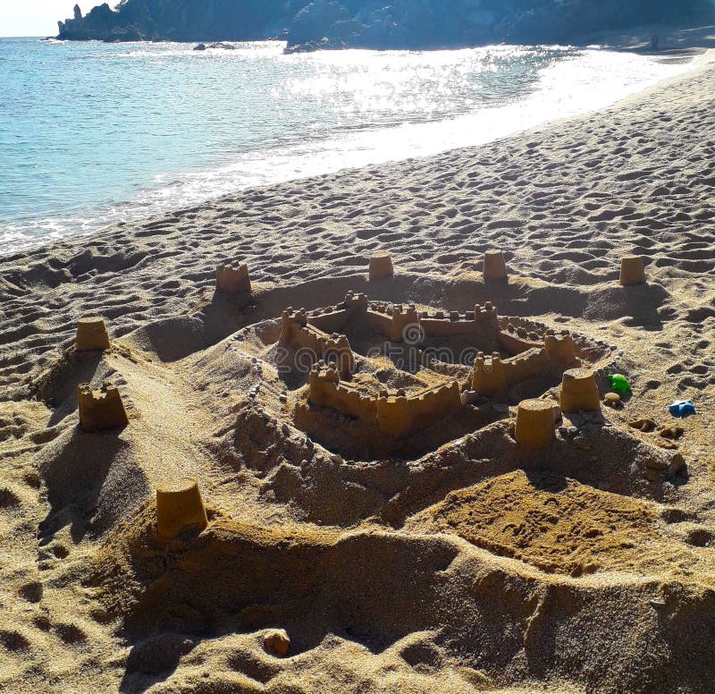 Small Children Castle Made of Sand on the Beach Stock Photo - Image of ...