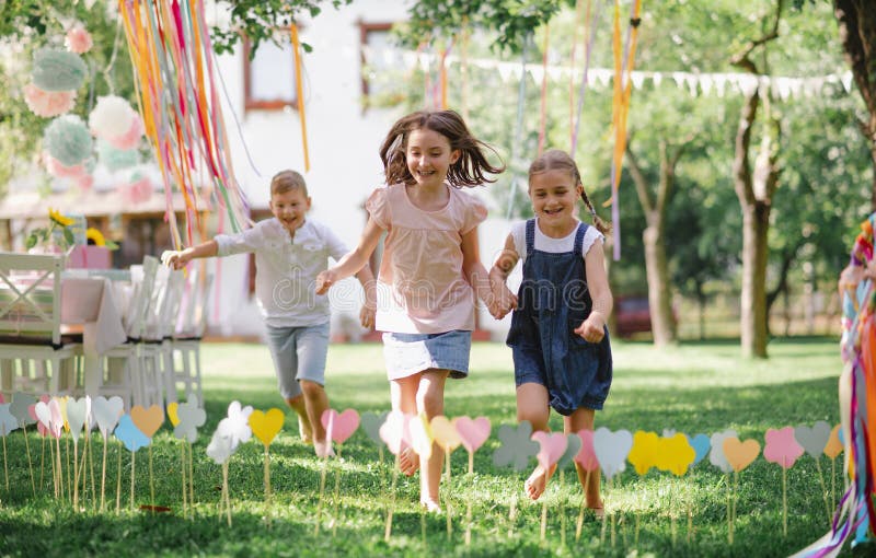 Small Children Outdoors in Garden in Summer, Running when Playing ...