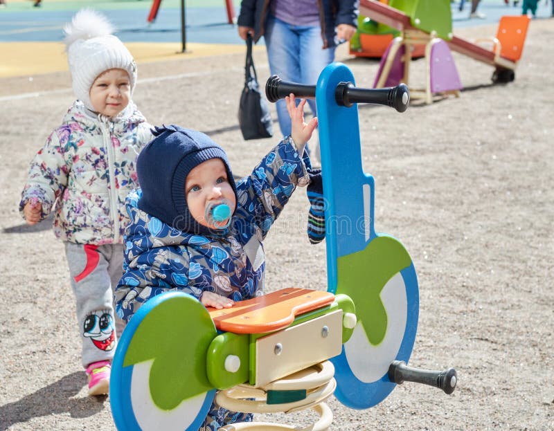 Small Children Play on the Playground. Child Development. Children`s ...