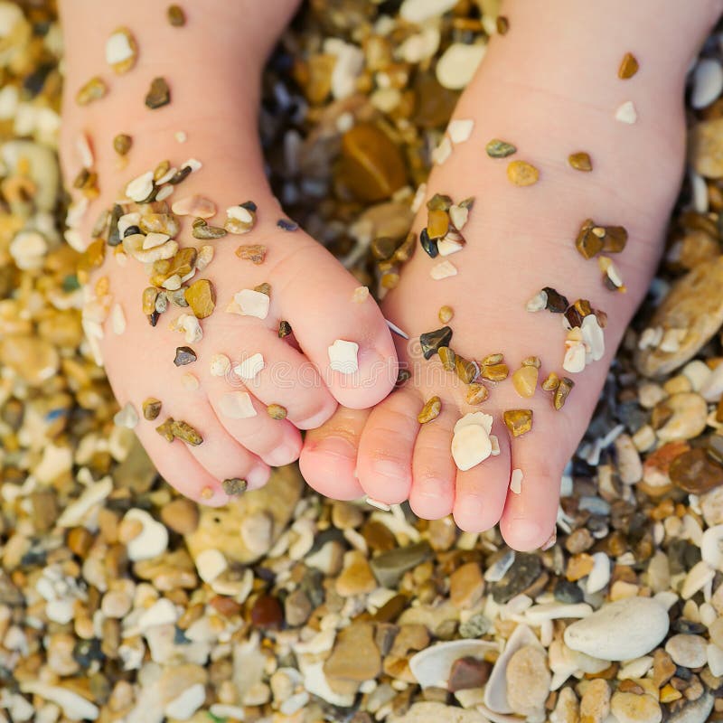 Children toe in the sand stock photo. Image of child - 59038222