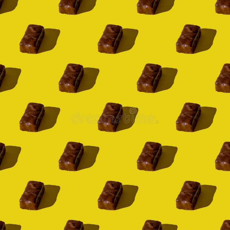 Small Chocolate Bar on a Yellowt Background. Seamless Pattern ...