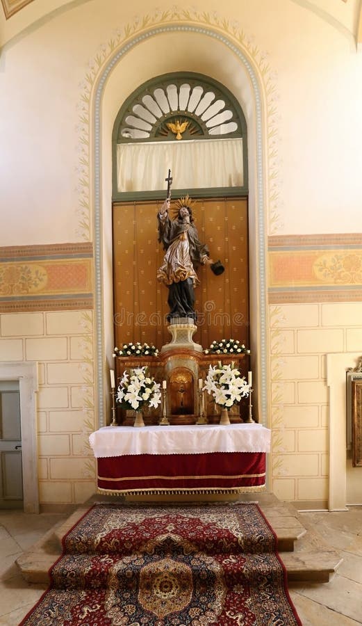 Church Altar with Red Carpet and Statue of the Saint Stock Photo ...