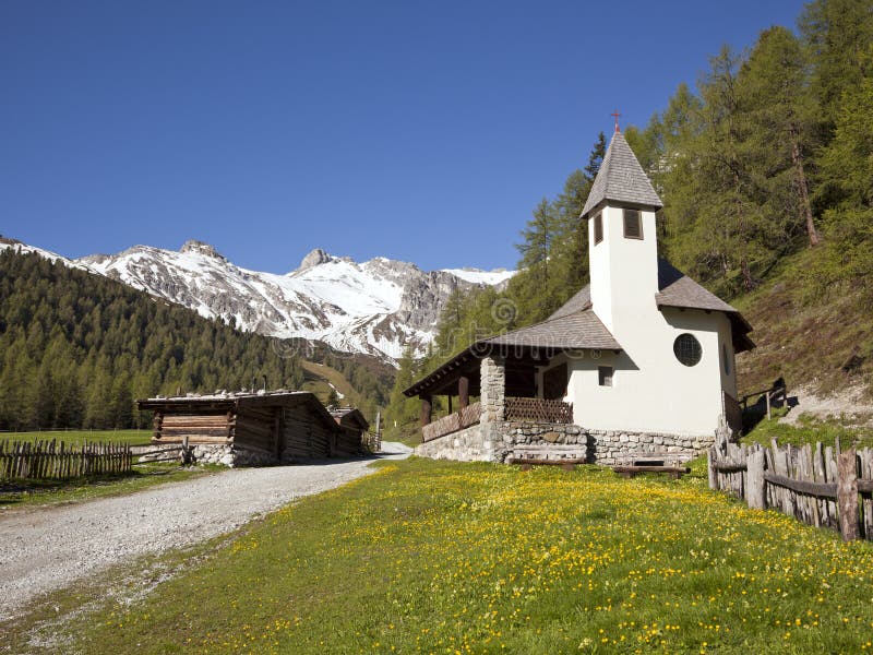 Small Church and Log Cabins in the Austrian Alps Stock Image - Image of ...