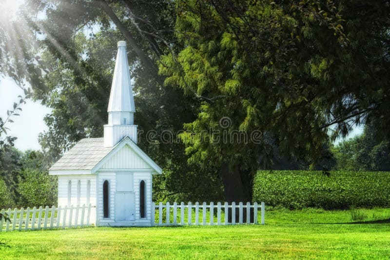 Small church in sunlight stock photo. Image of fence - 15531014