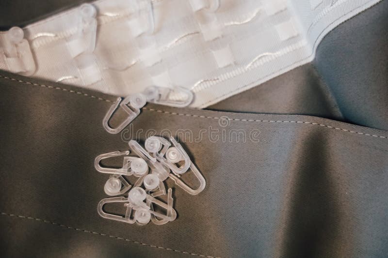 Clear Plastic Clips for Curtains and Fabric Materials Arranged for a ...