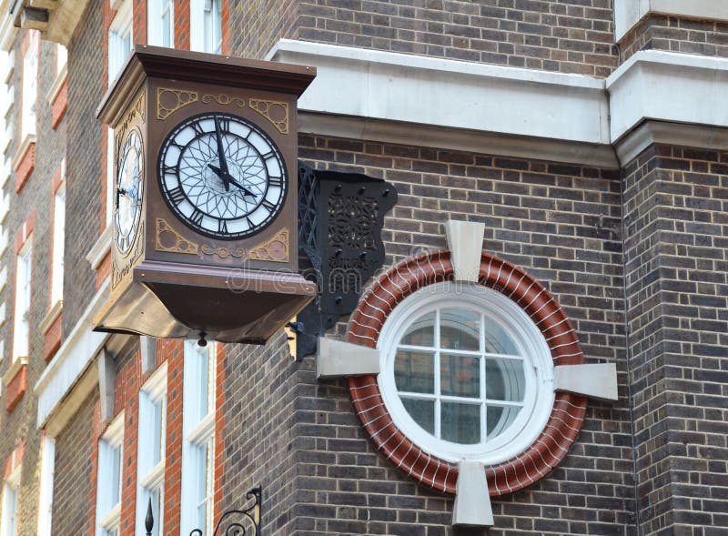 Small Clock on a Building Wall Stock Photo - Image of clock, great ...