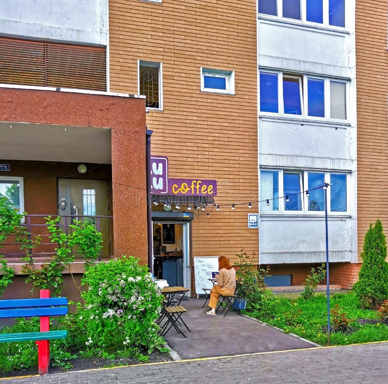 A Small Coffee Shop Located at the Bottom of a Multi-storey Building ...