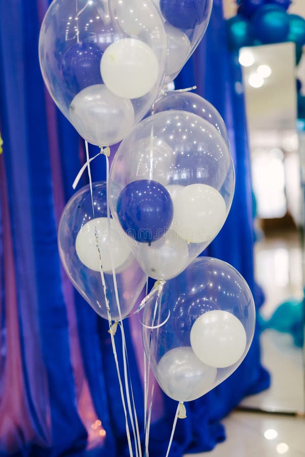 Small Colorful Balloons on a Blue Background Stock Image - Image of ...