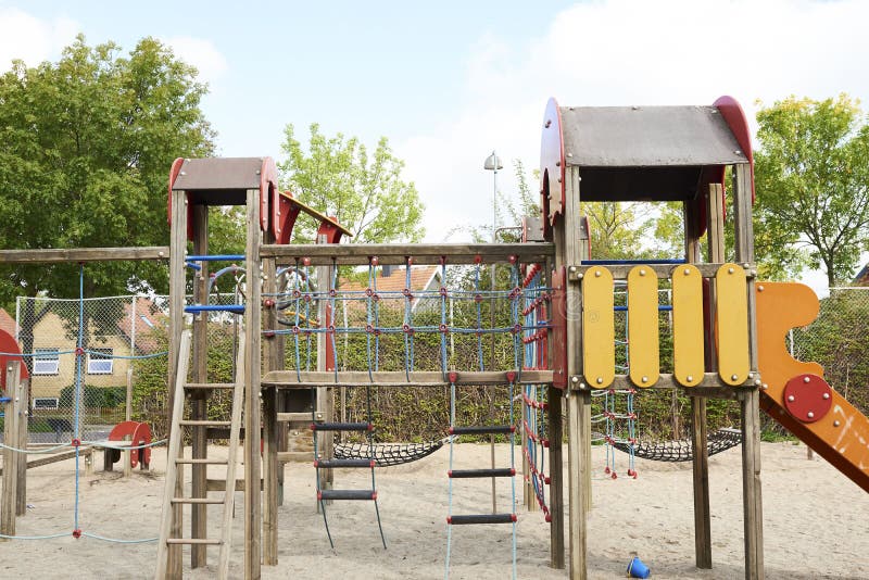 A Small Colorful Children Playground in the Sand Stock Photo - Image of ...
