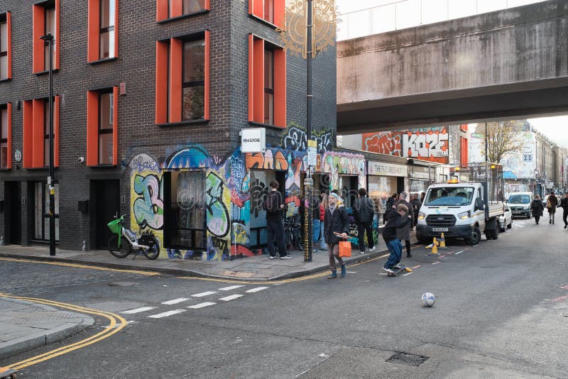 A Small and Colorful Store Filled with Graffiti, Shoreditch, Uk ...