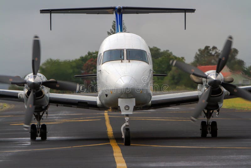 Small Commercial Passenger Aircraft on Runway. Stock Photo - Image of ... Small Commercial Passenger Aircraft on Runway. Stock Photo - Image of ...