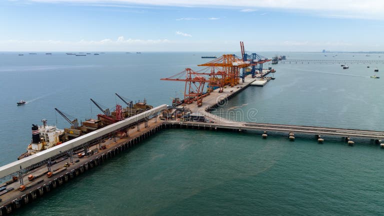 Small Commercial Shipping Port Loading and Unloading Cargo from ...