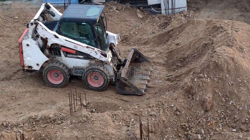Small Compact Bulldozer at Construction Site Clearing Soil, Top View ...
