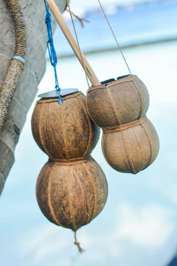 Small Containers with Ropes Made from Coconut Shells Stock Photo ...