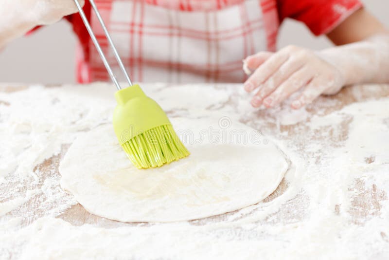 The Chef Oiling a Puff Pastry Appetizers before Baking in the Oven ...