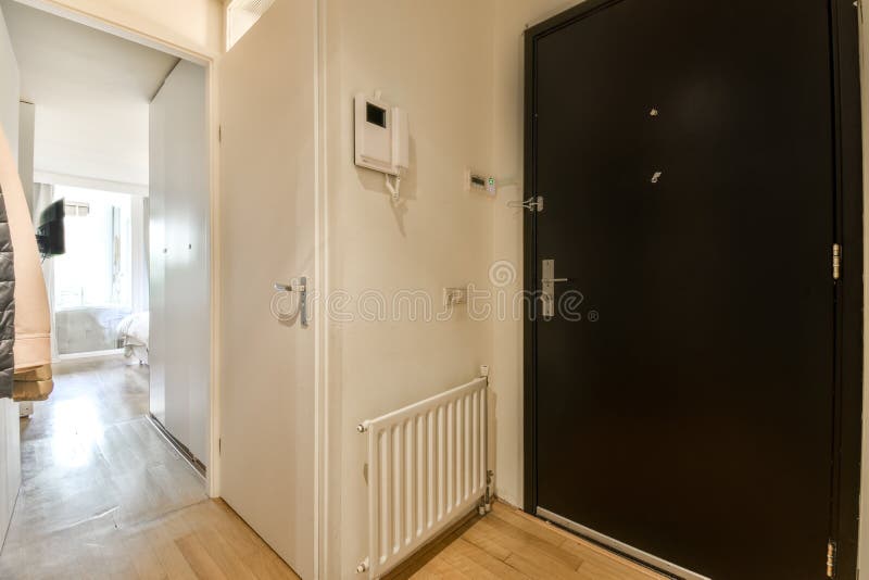 Small Corridor with Doors and Radiator Stock Image - Image of interior ...