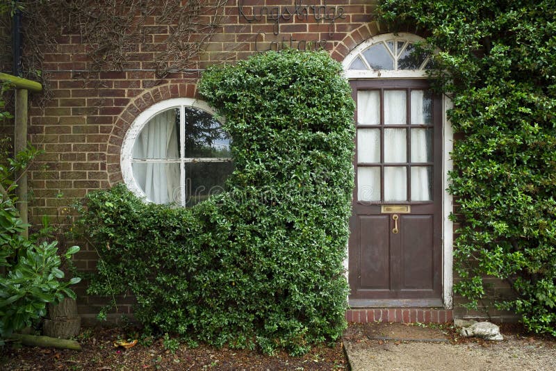 Small Cottage with Round Window and Front Door UK Editorial Stock Photo ...