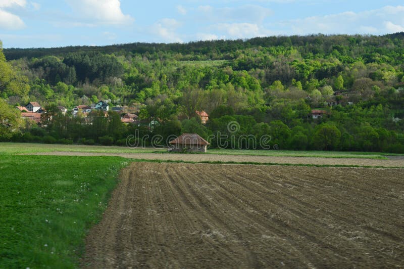 Small Country House in a Field Stock Photo - Image of hill, nature ...