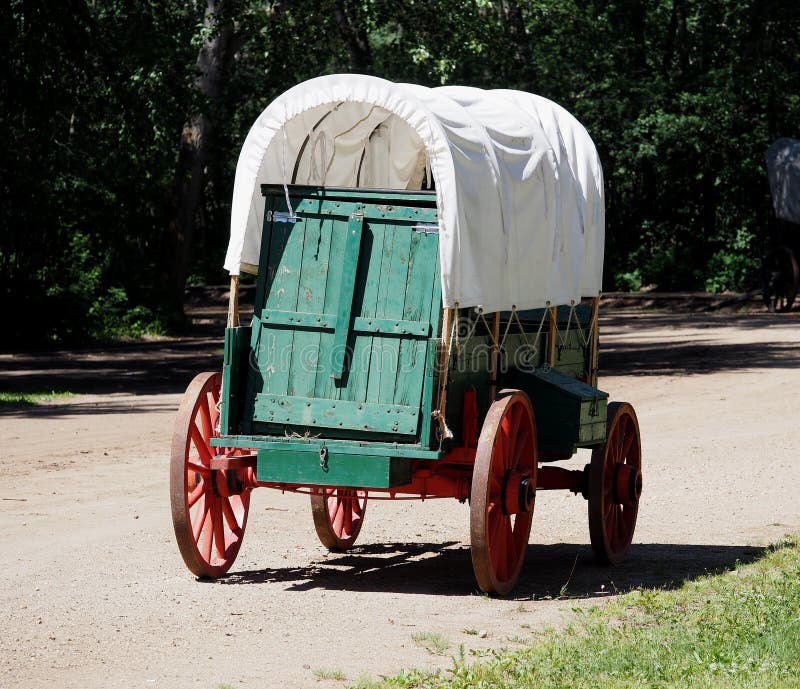 Small Covered Wagon stock image. Image of hauling, green - 73690383