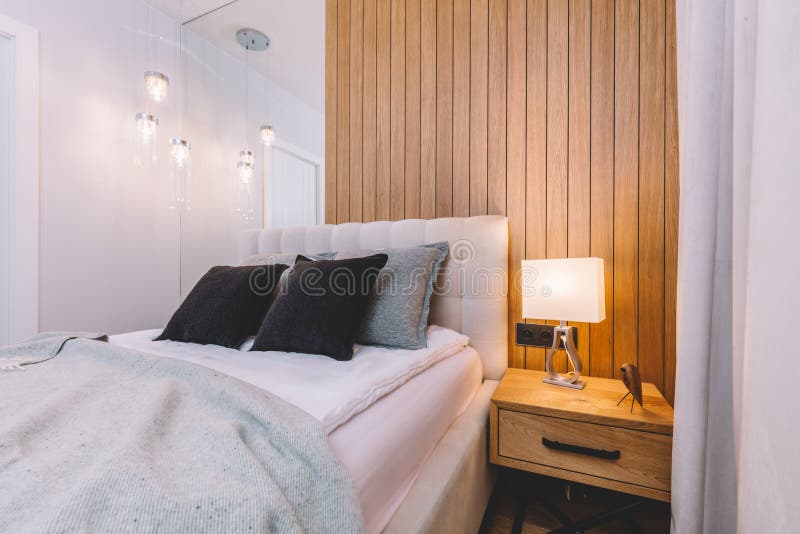 Small Cozy Bedroom with Comfortable Bed Stock Image - Image of door ...