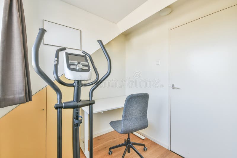 Small and Cozy Room with an Exercise Machine Stock Image - Image of ...