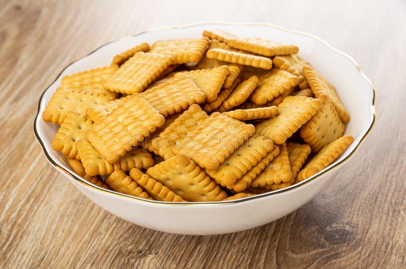 Small Crackers Different Shape in Bowl on Wooden Table Stock Image ...