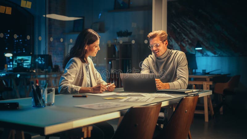 Small Creative Team Meeting in the Evening in Office. Young Project ...