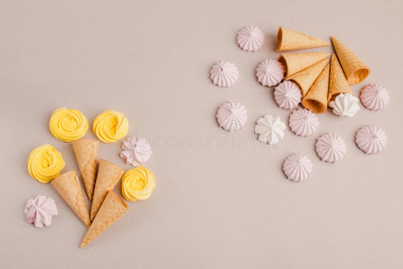 Small Crispy Waffle Ice Cream Cups with Colored Marshmallows on a ...