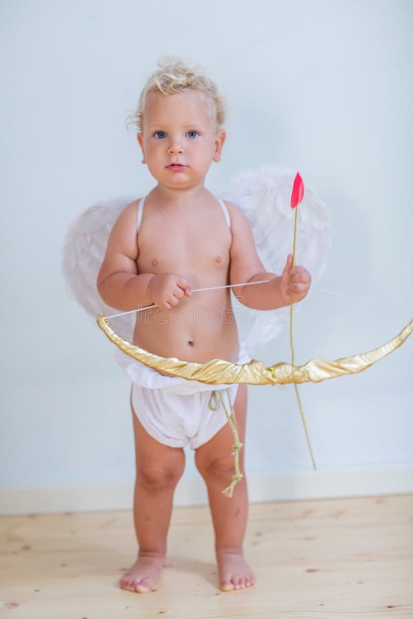 Small Cupid is Posing To the Camera Stock Photo - Image of character ...