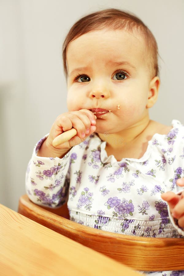 Small cute baby eating stock photo. Image of taste, appetite - 3850914