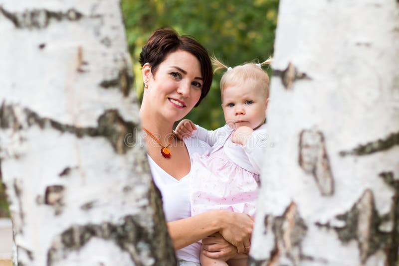 Small Cute Baby and Nice Mom Stock Photo - Image of clever, female ...